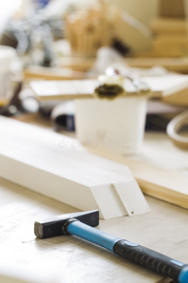 Hammer lying on the table stock photo. Image of metal - 77866532