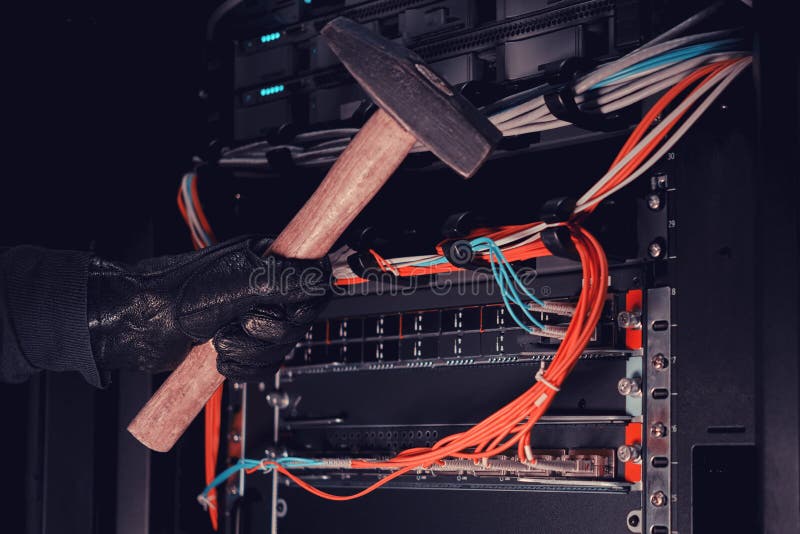 Hammer in Man Hand Near Computer Networking Equipment with Wires Stock ...