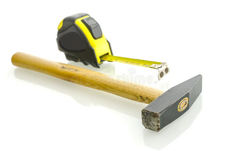 Hammer and measuring tape stock photo. Image of tool - 33270994
