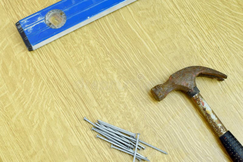 Hammer, Nails and Spirit Level on the Table Stock Image - Image of ...