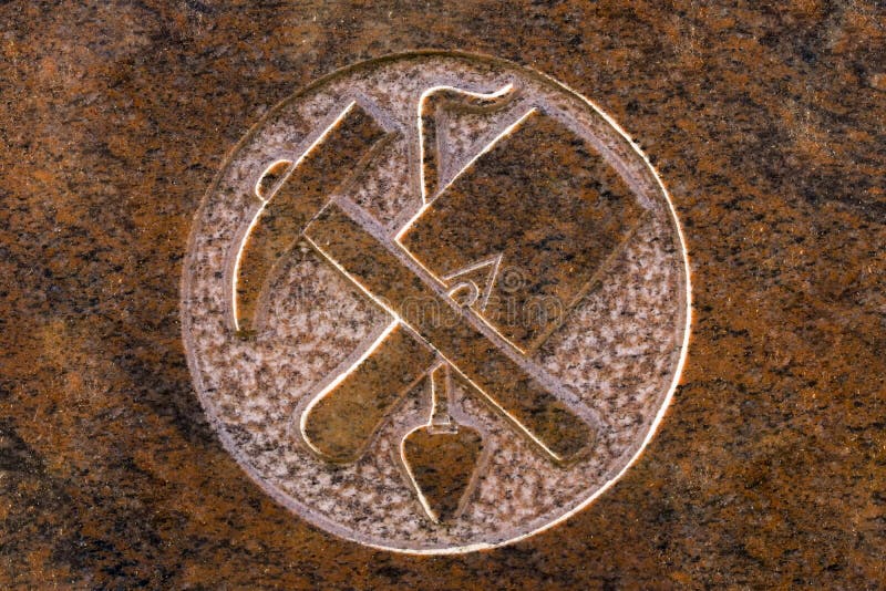 Hammer and Pick on Stone Surface Symbol of a Carpenter and Mason ...