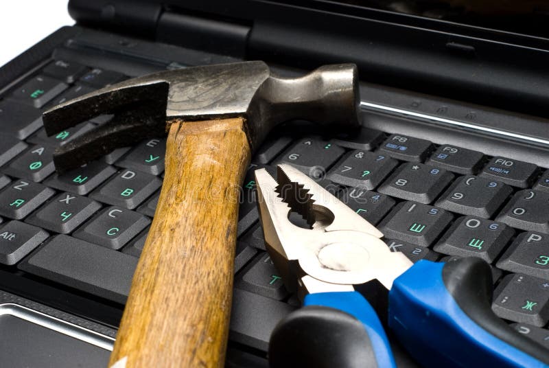 Hammer and Pliers on a Laptop Stock Image - Image of communication ...