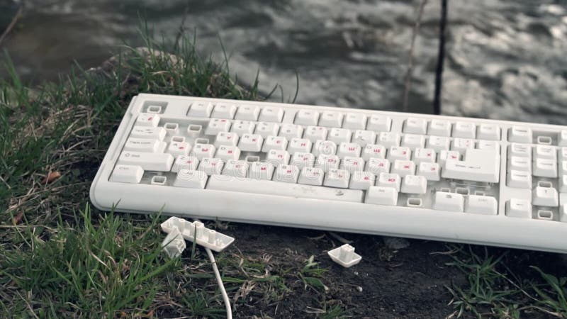 Hammer Smashes a Computer Keyboard. Broken Computer Keyboard in Nature ...