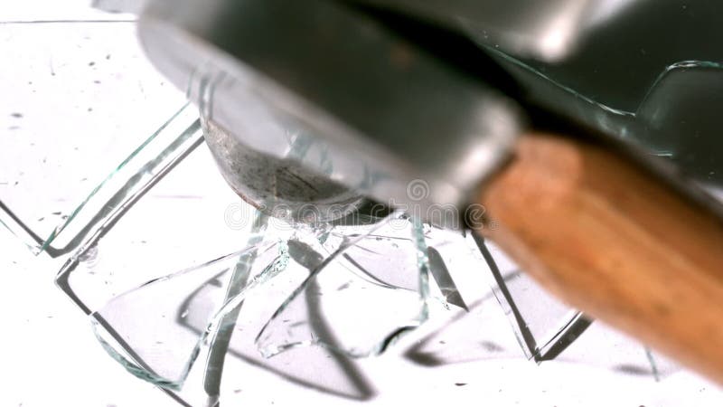 Hammer Smashing through Pane of Glass Stock Footage - Video of ...