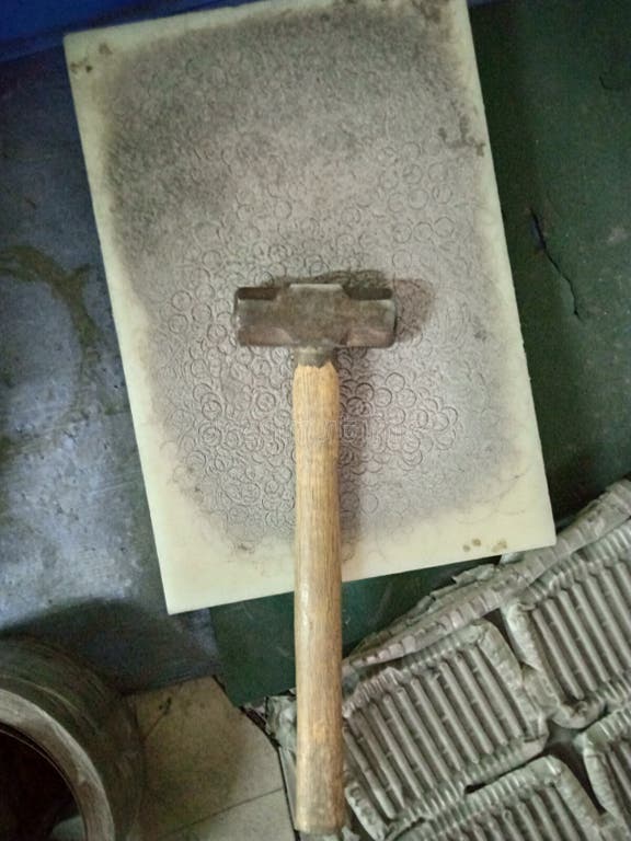 Hammer on the tapping base stock image. Image of hammer - 220340021