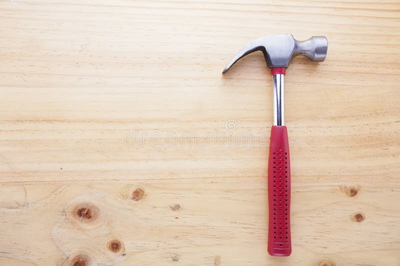 A hammer on a wood table stock photo. Image of knife - 59807632