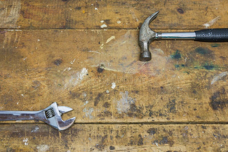 Hammer and Wrench on Work Workshop Bench Background Stock Image - Image ...
