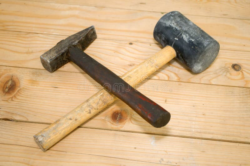 2 Hammers, One is of Iron and the Other is Rubber Stock Photo - Image ...
