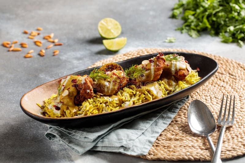 Fish Biryani Rice Pulao with Salad, Chutney, Raita and Sauce Served in ...