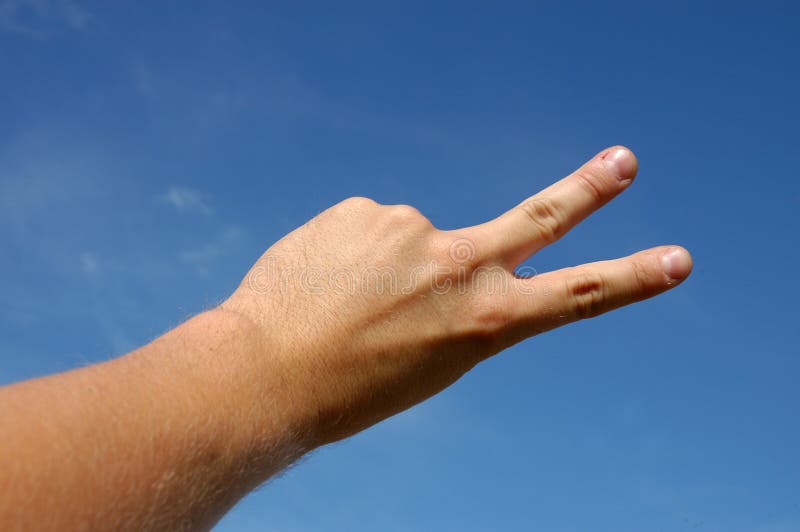 Hand with Two Fingers Raised Stock Image - Image of upraised, hand: 1153287
