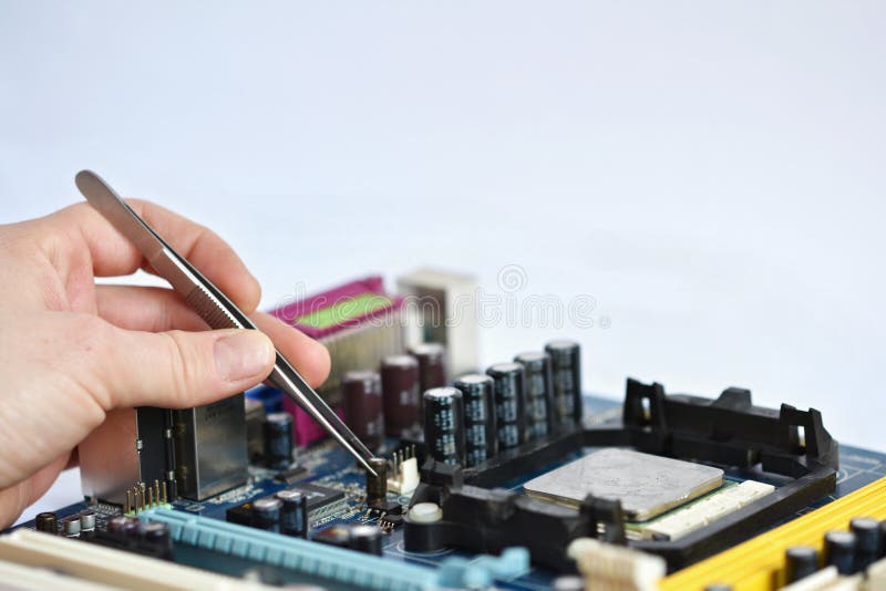 Hand Above Board with Components. Repair of Computers and Modern ...