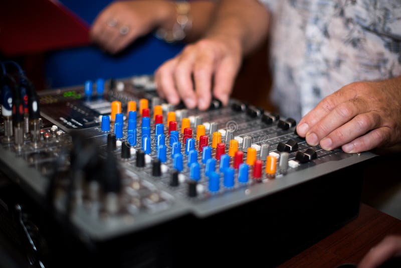 Hand adjusting audio mixer stock photo. Image of audio - 63253960