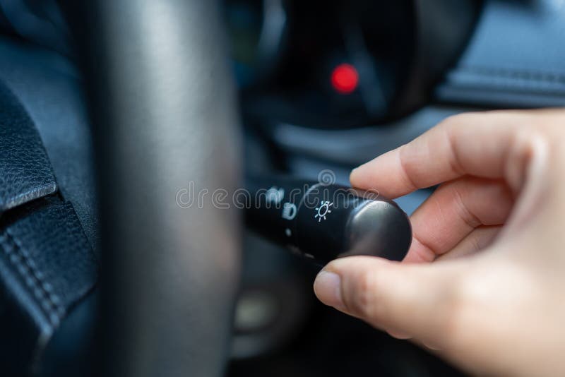Hand Adjusting Car Headlight Control Switch Stock Photo - Image of ...