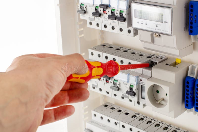 Hand Adjusting Circuit Breaker with Screwdriver Stock Photo - Image of ...