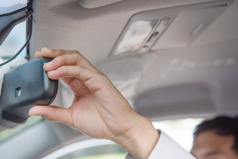 Hand Adjusting Rear View Mirror Stock Photo - Image of adjusting, road ...