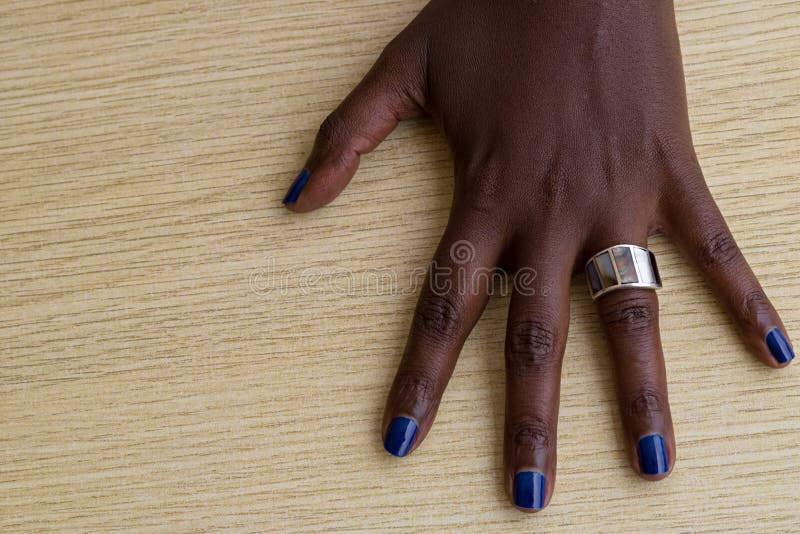 The Hand of an African Woman Stock Image - Image of ring, table: 152668975
