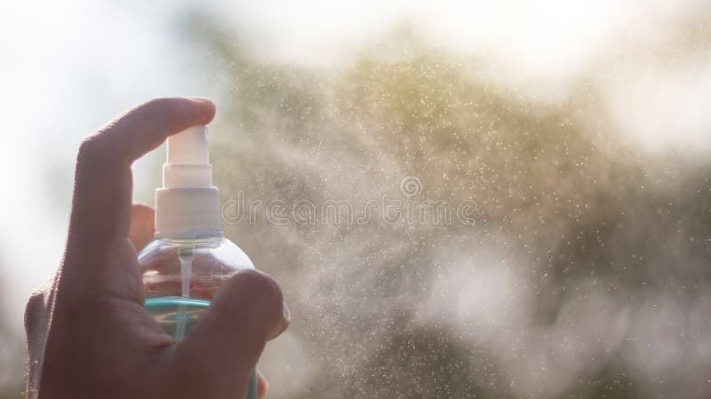 Hand with alcohol spray. stock image. Image of alcohol - 213257651