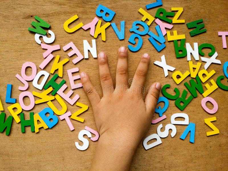 Hand and alphabets stock image. Image of hand, school - 85951823