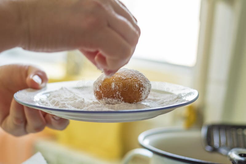 Hand Applying Sugar on a Round Donut Stock Photo - Image of hand, tasty ...