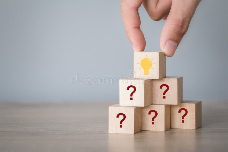 Hand Arranging Wood Block Stacking with Icon Question Mark Stock Photo ...