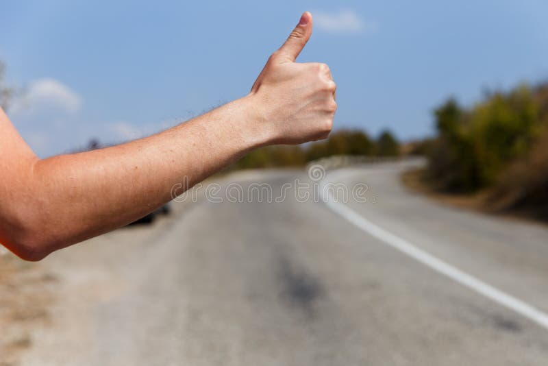 Hand on background of road stock image. Image of background - 84961151