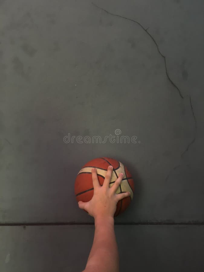 The Hand with Ball Against the Wall Stock Photo - Image of hand ...