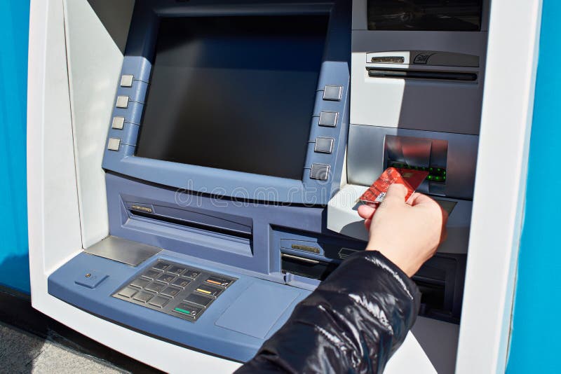 Hand with bank card at ATM stock image. Image of connection - 91512451