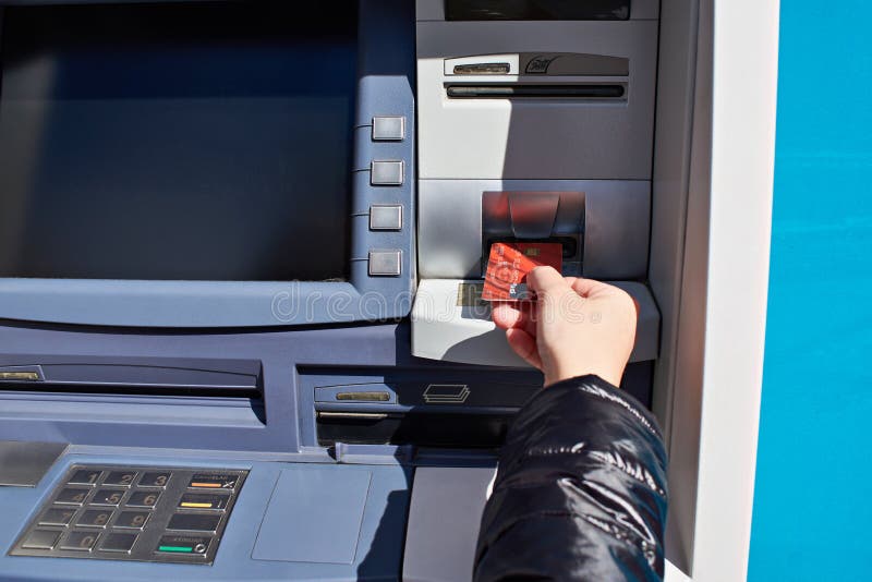Hand with bank card at ATM stock photo. Image of entrance - 91512512