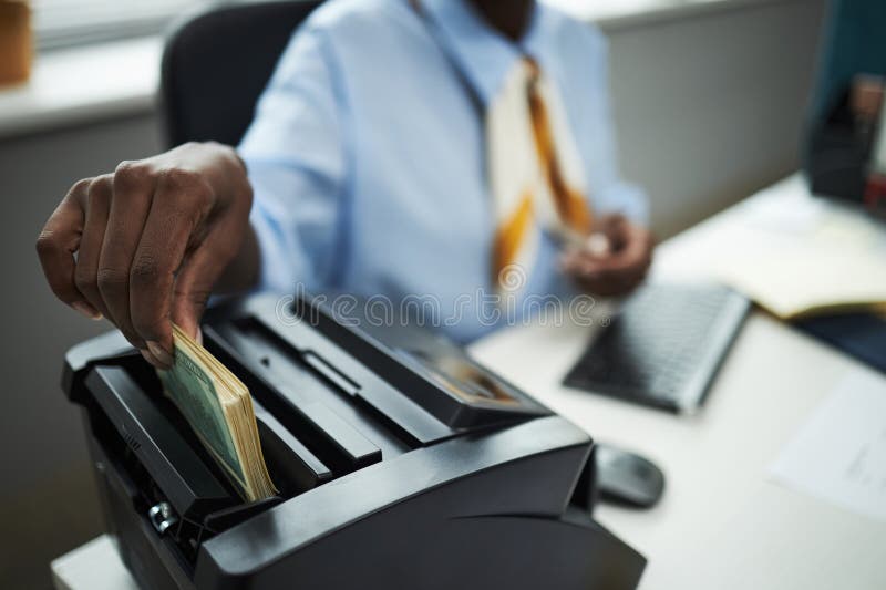 Hand of Bank Worker Counting Cash with Bill Counter in Office Stock ...