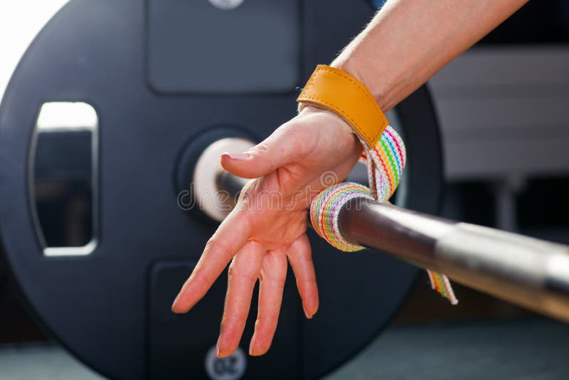 Hand on the Barbell. Young Athlete Getting Ready for Weight Lifting ...