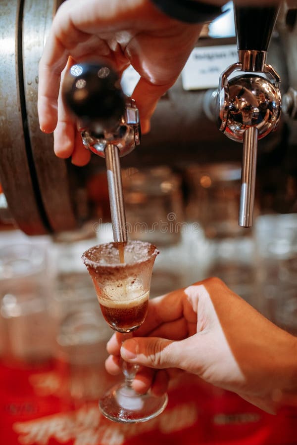 Hand of Bartender Pouring a Beer in Tap. Pouring Beer for Client. Stock ...