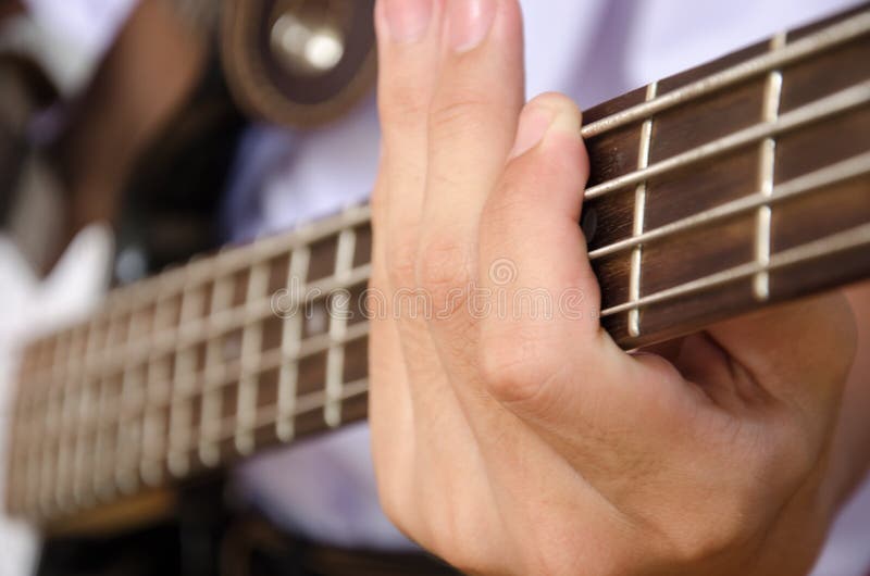 Hand for bass guitar stock image. Image of play, closeup - 41508501