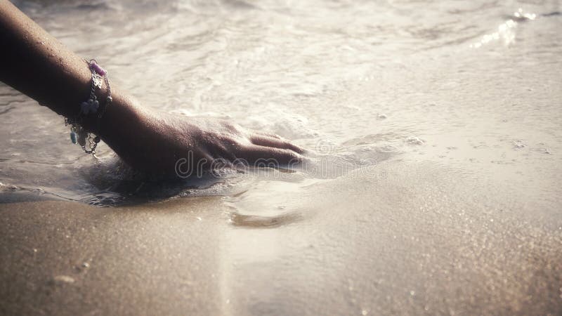 Hand and beach stock image. Image of natural, coast - 140545719