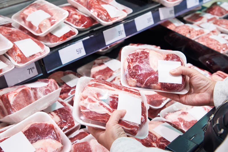 Hand with Beef Meat in Shop Stock Image - Image of display, shop: 270055861