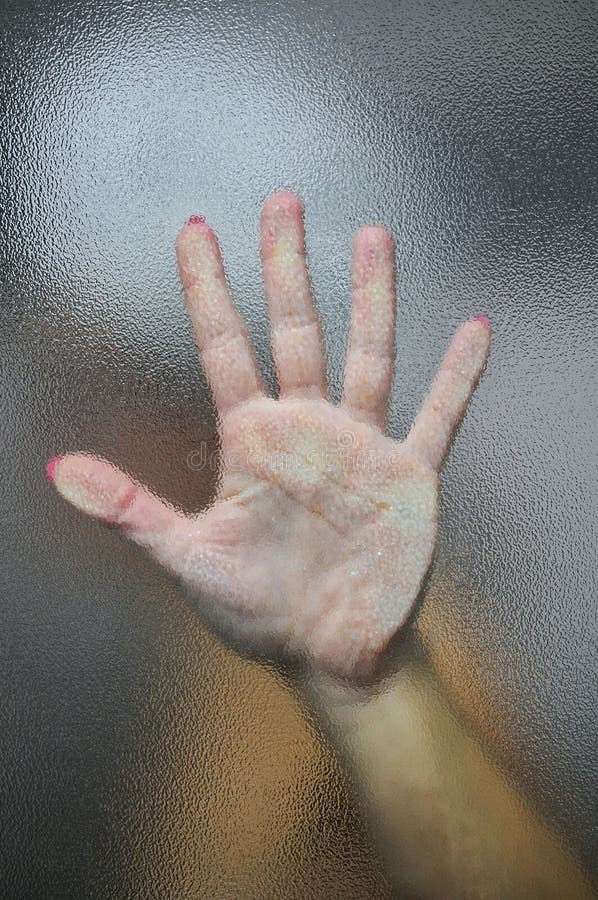 Hand behind the glass stock photo. Image of hand, glass - 163155708