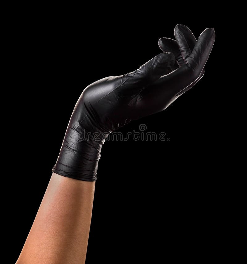 Hand in Black Gloves Taking or Showing Something Isolated on Black ...