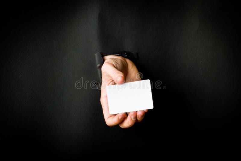 Hand through black paper stock image. Image of human - 38998425