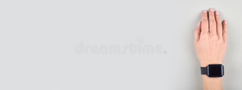 Hand with Black Smart Watches on Grey Background. Flat Lay, Overhead ...