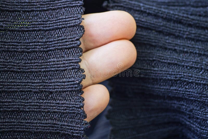 Hand in a Black Woolen Sweater Sleeve Stock Image - Image of pullover ...