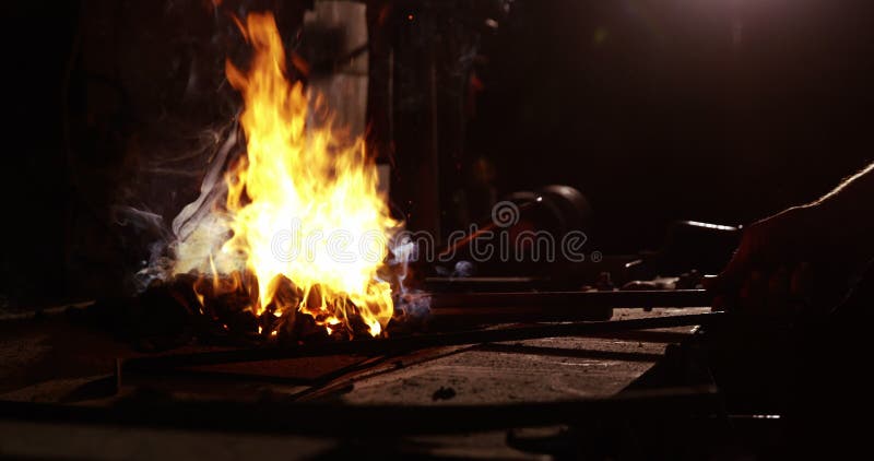 Blacksmith Heating Metal Rod in Fire 4k Stock Footage - Video of ...