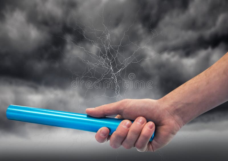 Hand with Blue Baton and Lightning Against Stormy Sky Stock ...