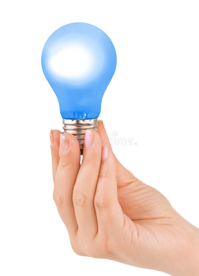 Hand with lamp and plant stock photo. Image of inspiration - 9825726
