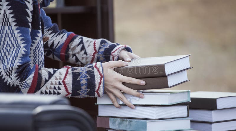 Hand with books stock image. Image of outdoor, stack - 44623417