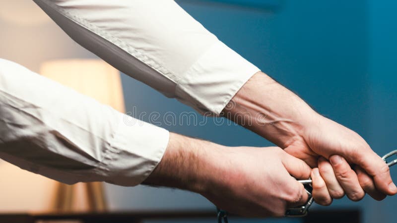 Hand of the Boss in the Office Pulls an Employee with a Chain Stock ...