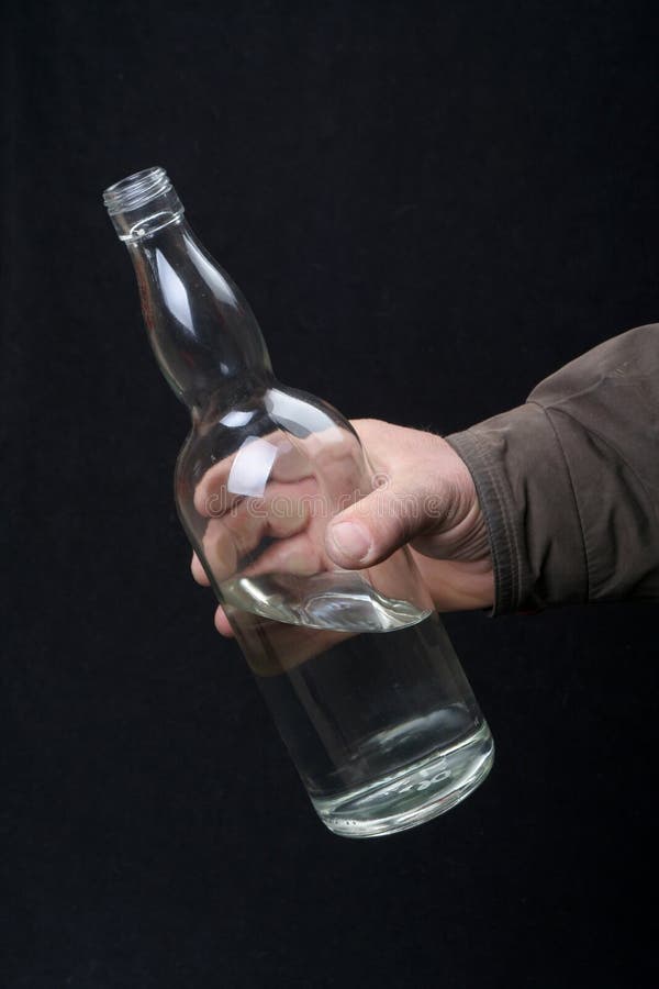Hand with bottle stock image. Image of spirit, desperate - 5424241