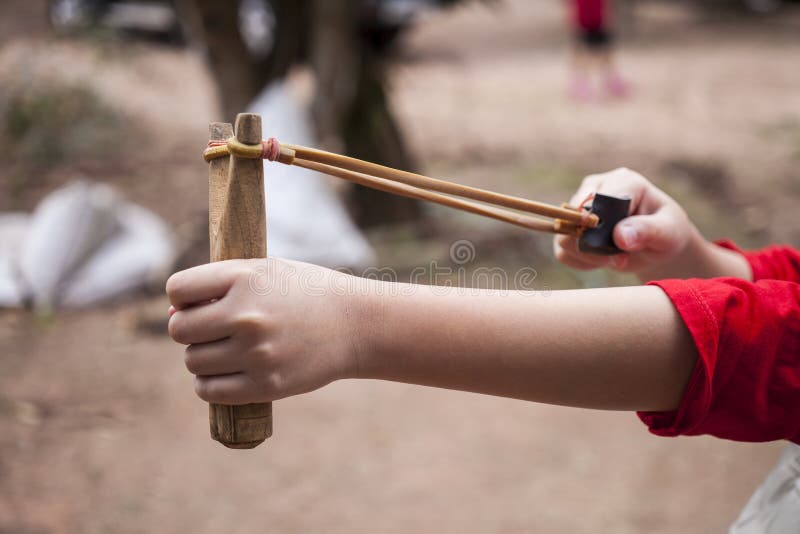 Hand Boy Pulling Sling Shot Stock Image - Image of pulling, stones ...