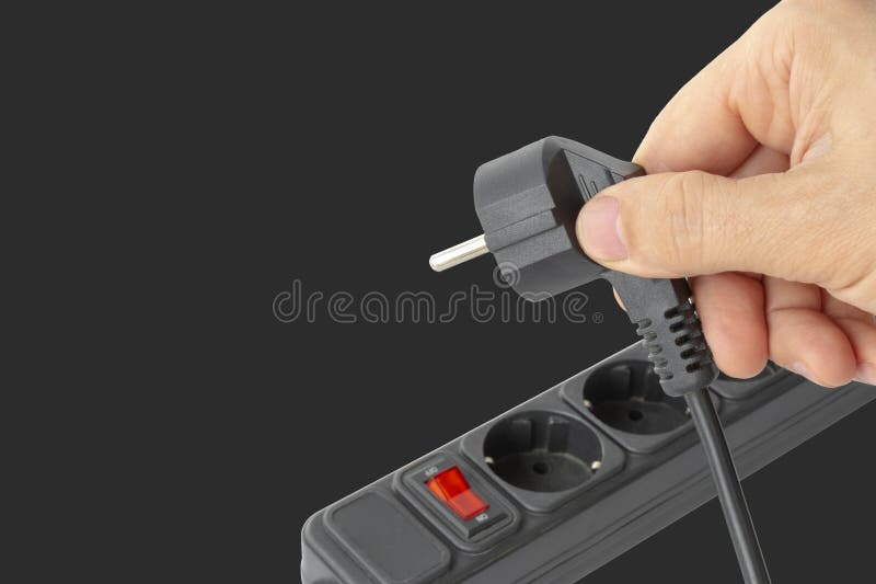 The Hand Brings the Plug To the Surge Protector Stock Photo - Image of ...
