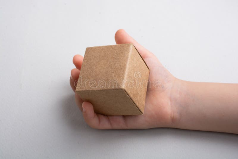 Cardboard Cube stock photo. Image of sidewalk, cardboard - 10643470