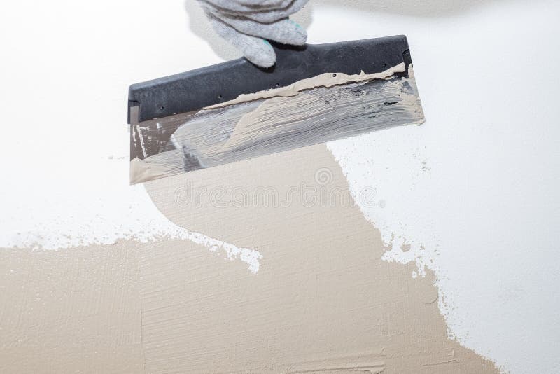 Hand of Builder Worker Plastering at Wall.Renovation Workers Hand ...