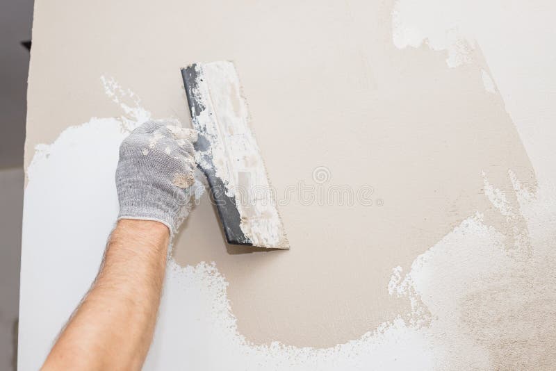 Hand of Builder Worker Plastering at Wall.Renovation Workers Hand ...